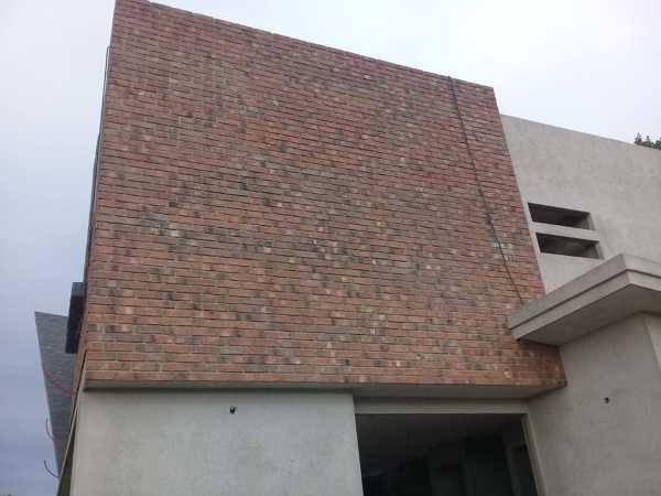 Foto: Forrado de de Muro Aparente en Tabique Rojo de Verde Naturaleza ...